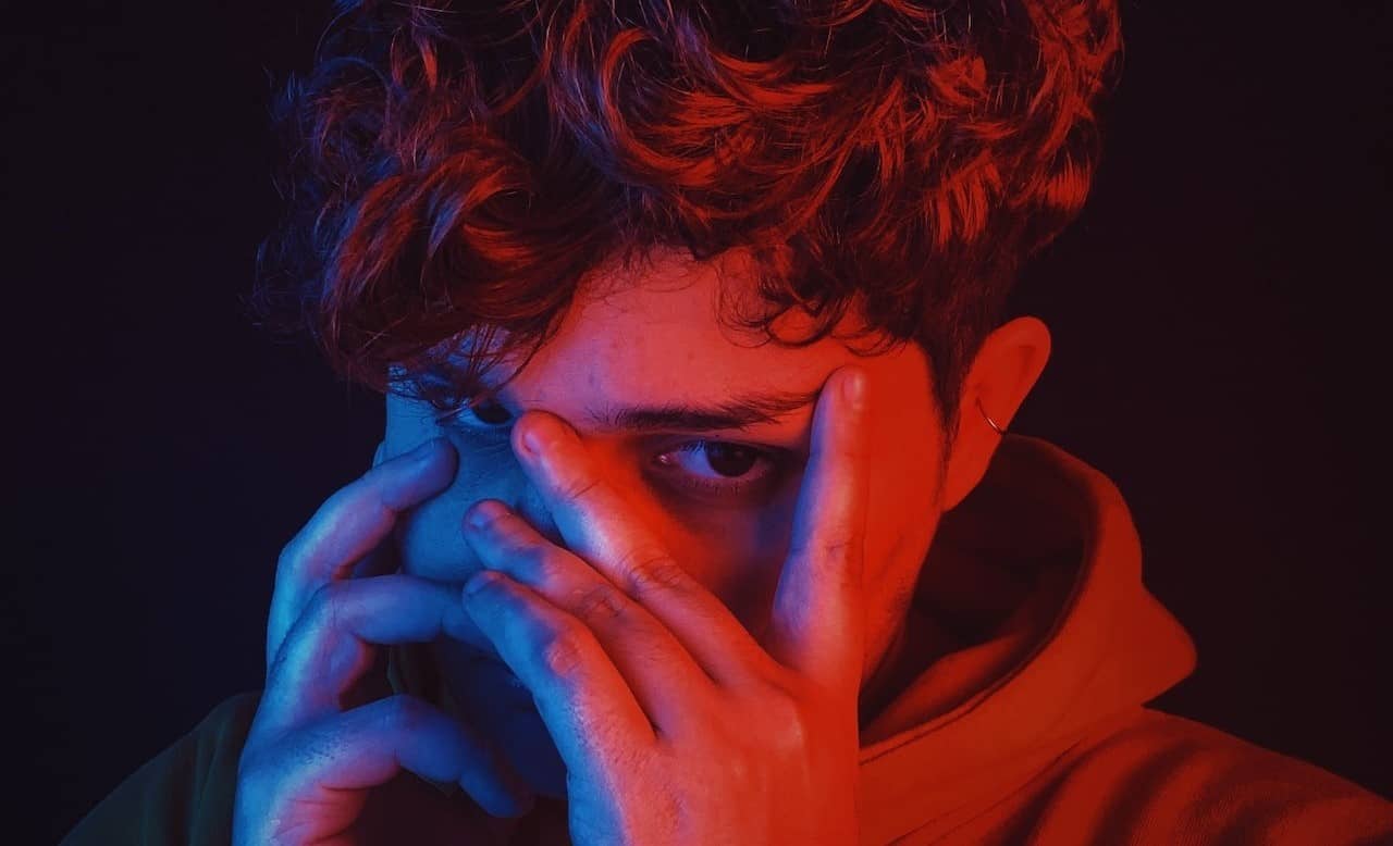 15 Spiritual Meanings of Dreams About Hiding From Someone